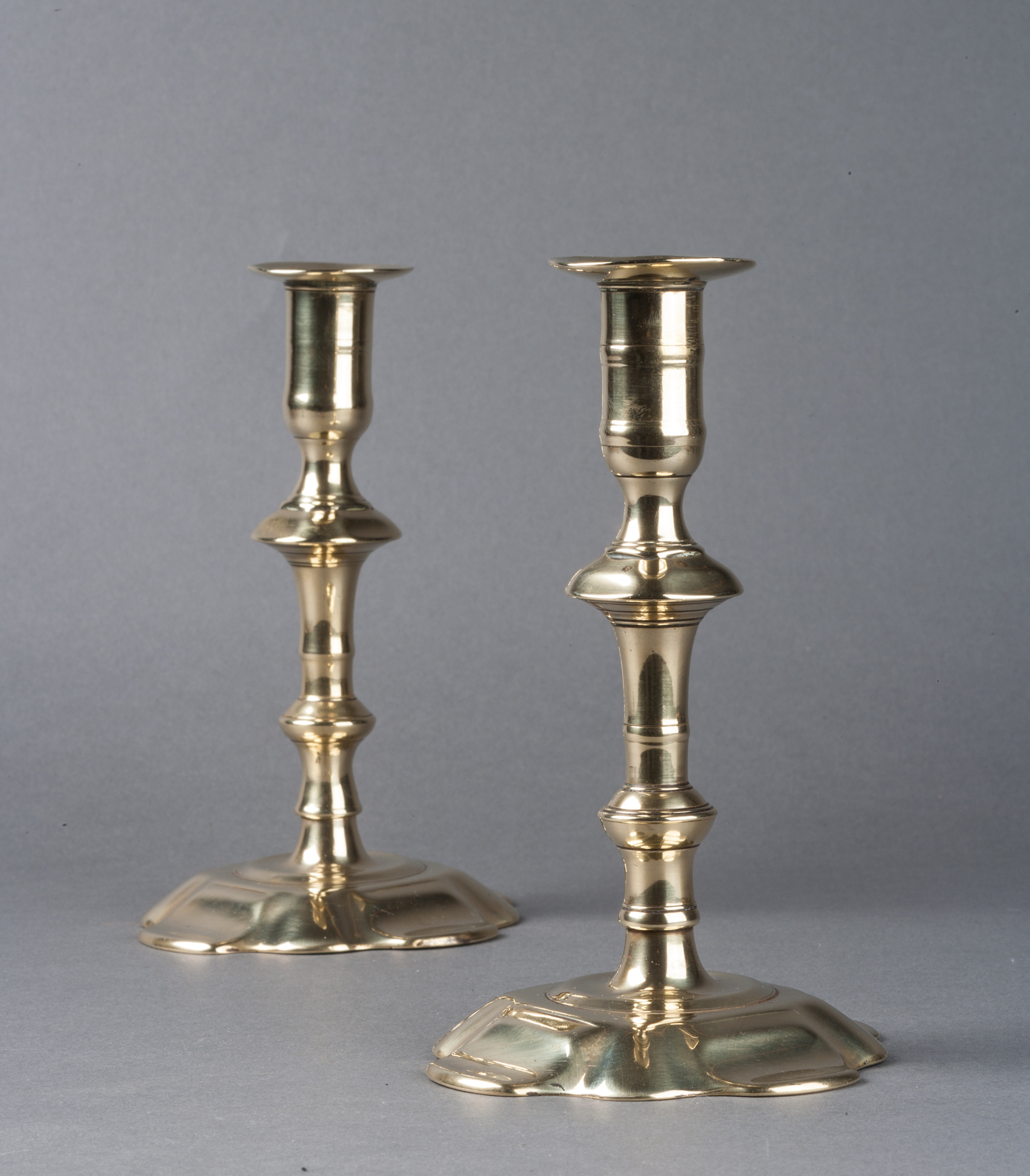 George II Petal-Based Brass Candlesticks - Walpole Antiques